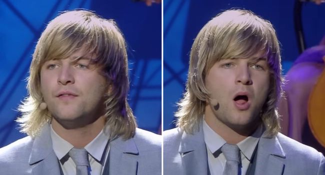 Keith Harkin sits on stage and sings “All Out of Love", creating a rare ...